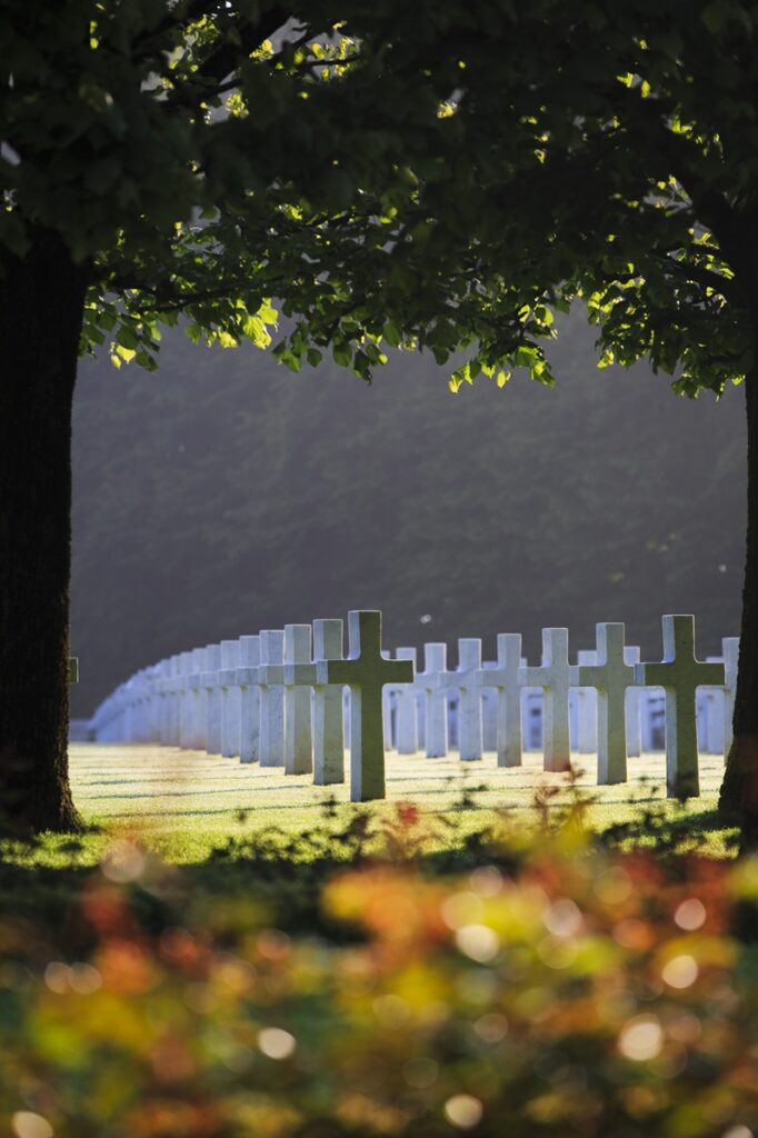 White marble headstones stand perfectly aligned at St. Mihiel American Cemetery - American ...